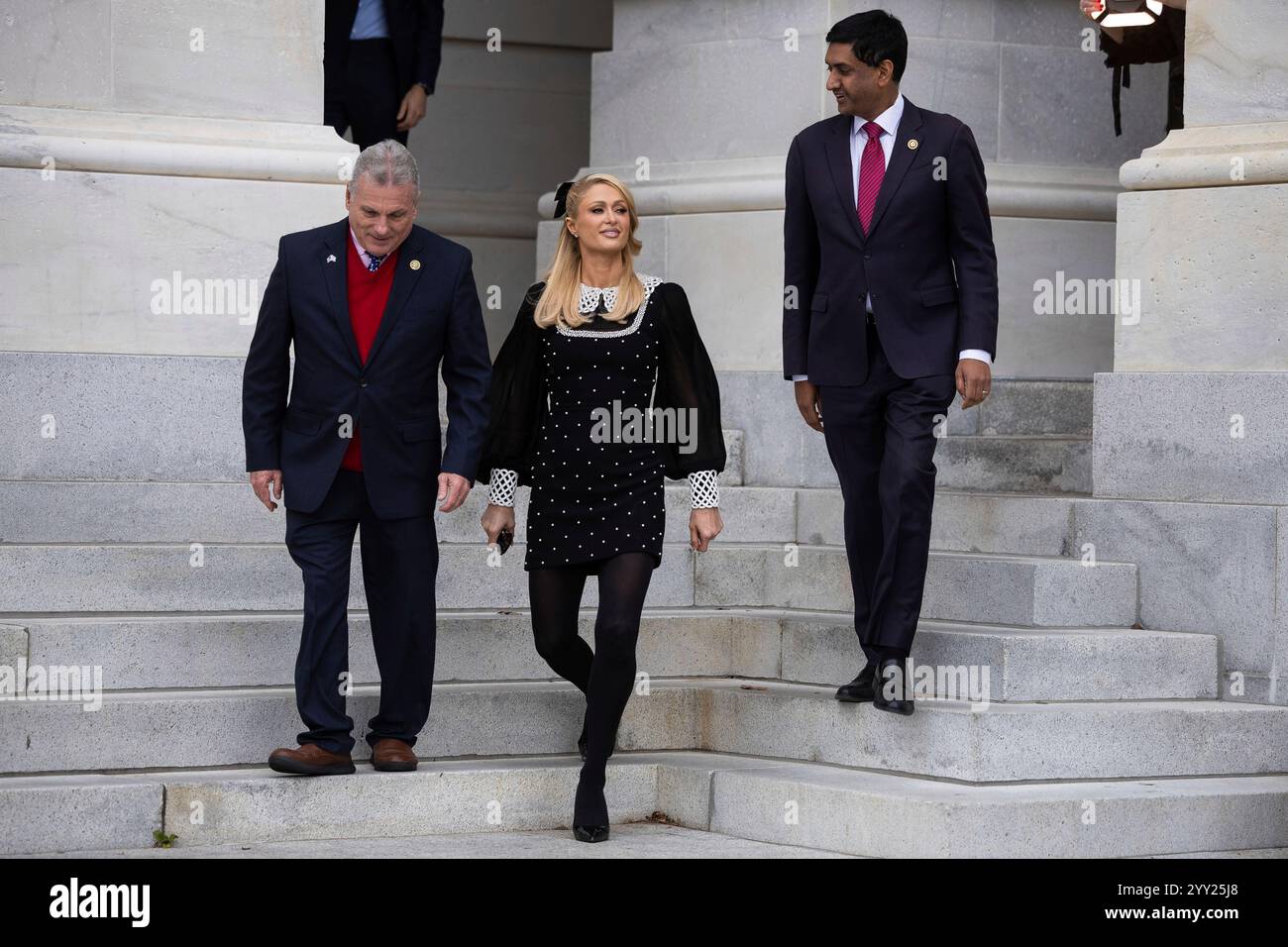 Paris Hilton, center, is seen with Reps. Buddy Carter (R-Ga.) and Ro ...