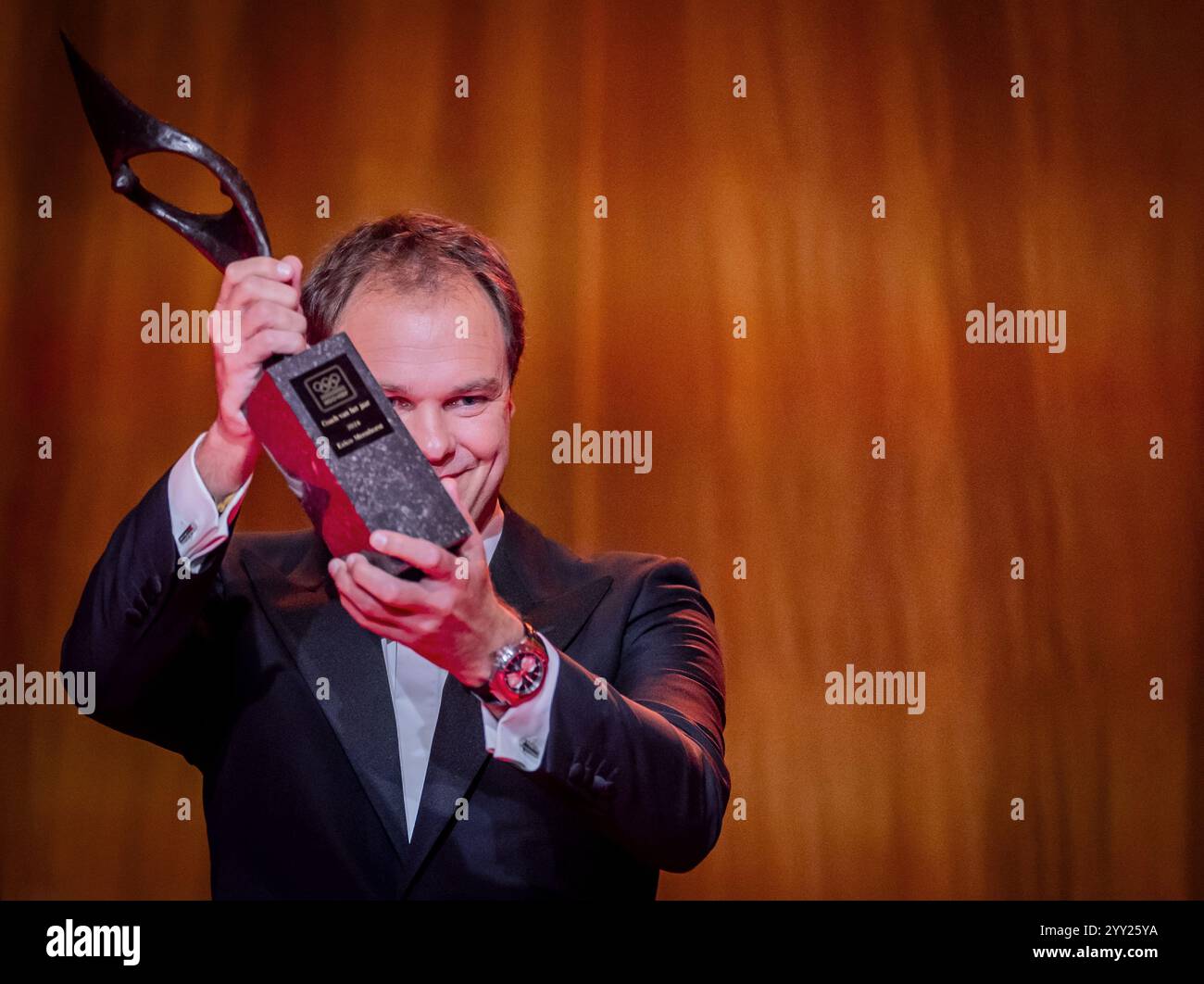 ARNHEM - Rowing coach Eelco Meenhorst on the podium after winning Coach ...