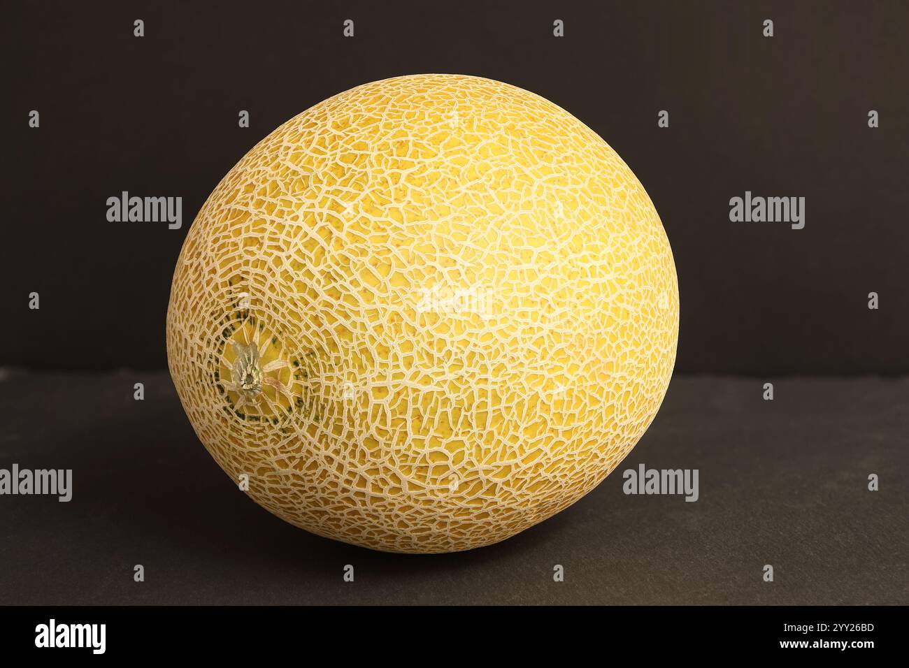 Still life with Galia melon on slate board with dark background. Photo ...