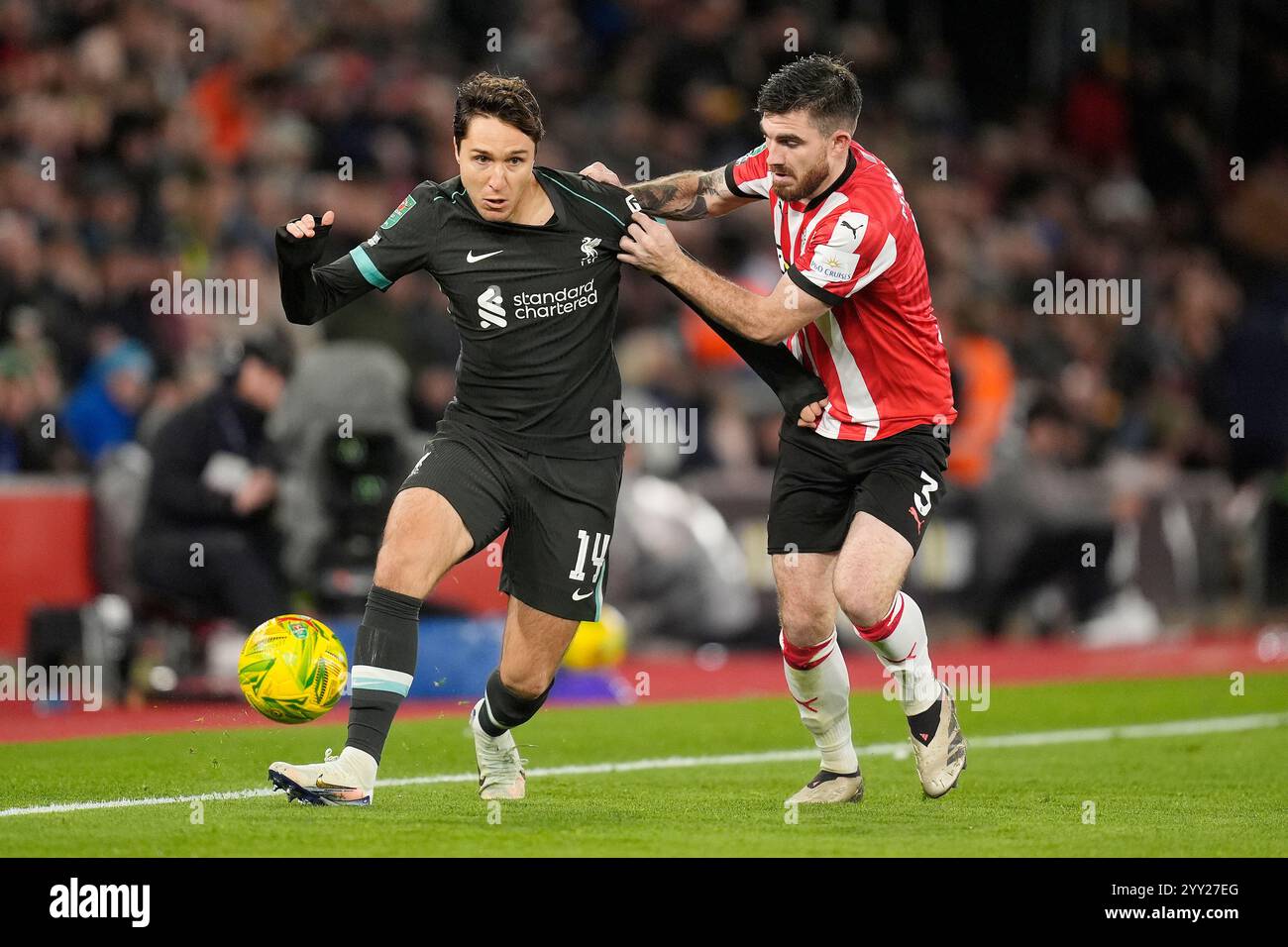 Liverpool's Federico Chiesa (left) and Southampton's Ryan Manning ...