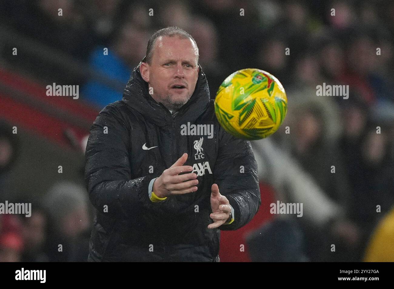 Liverpool's assistant coach Sipke Hulshoff returns the ball during the ...