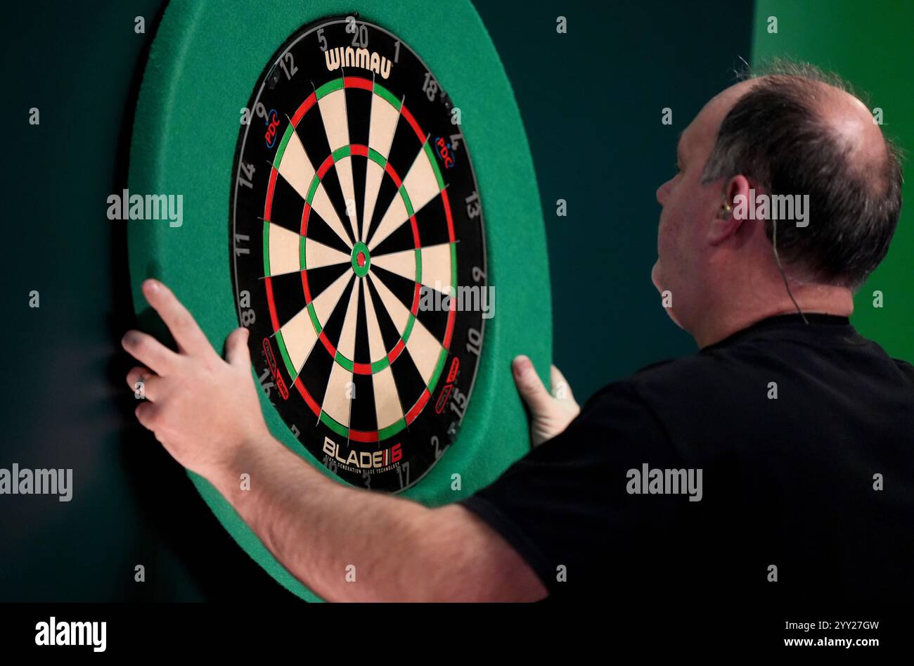 A judge changes the dart board during day four of the Paddy Power World ...