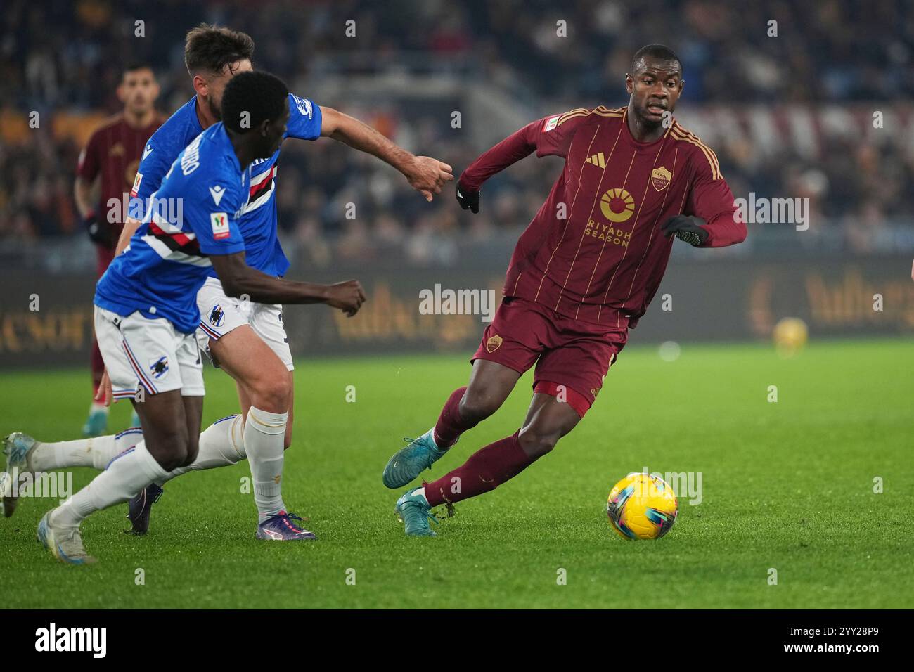Roma's Evan Ndicka, right, controls the ball during the Italian Cup ...