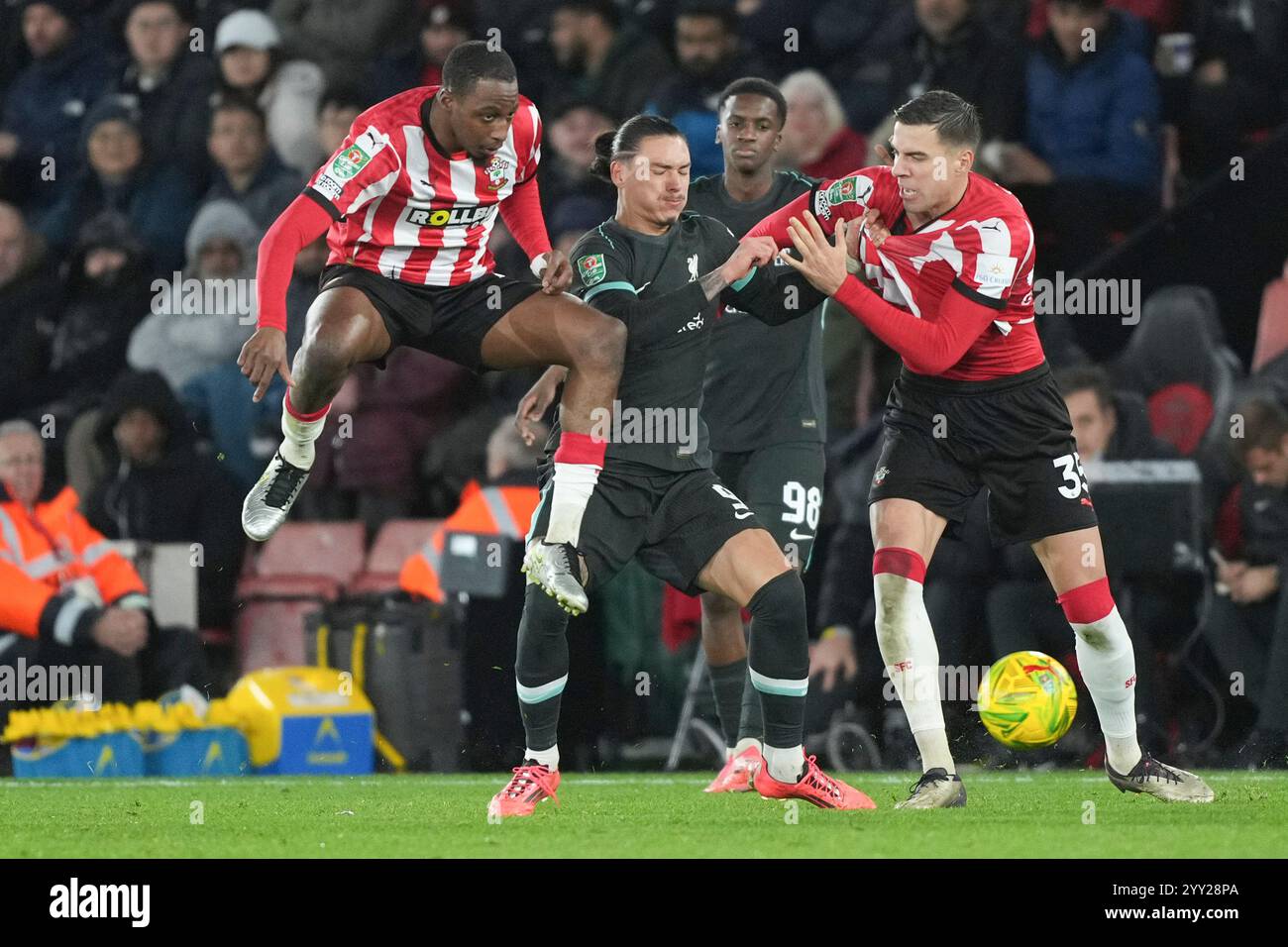Liverpool's Darwin Nunez in action between Southampton's Joe Aribo ...