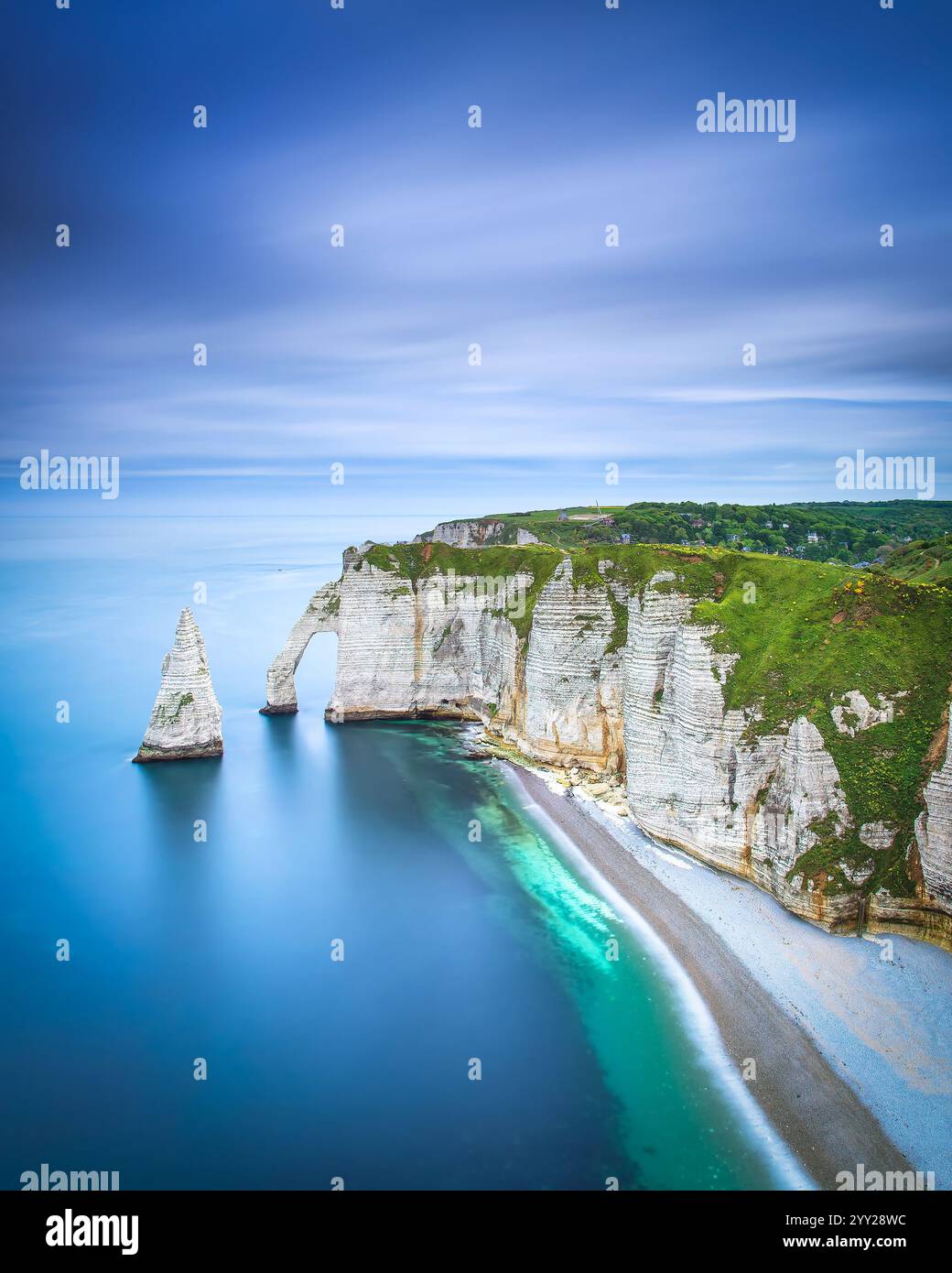 Etretat Aval cliff, rocks and natural arch landmark and blue ocean ...
