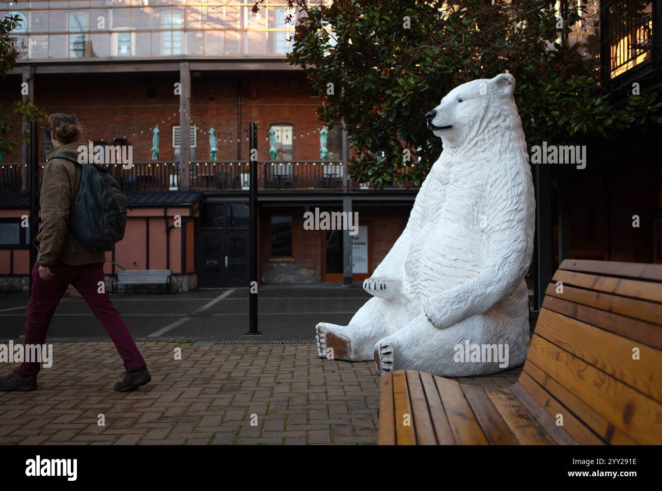 Victoria, Can. 18th Dec, 2024. A polar bear statue sits in Market ...