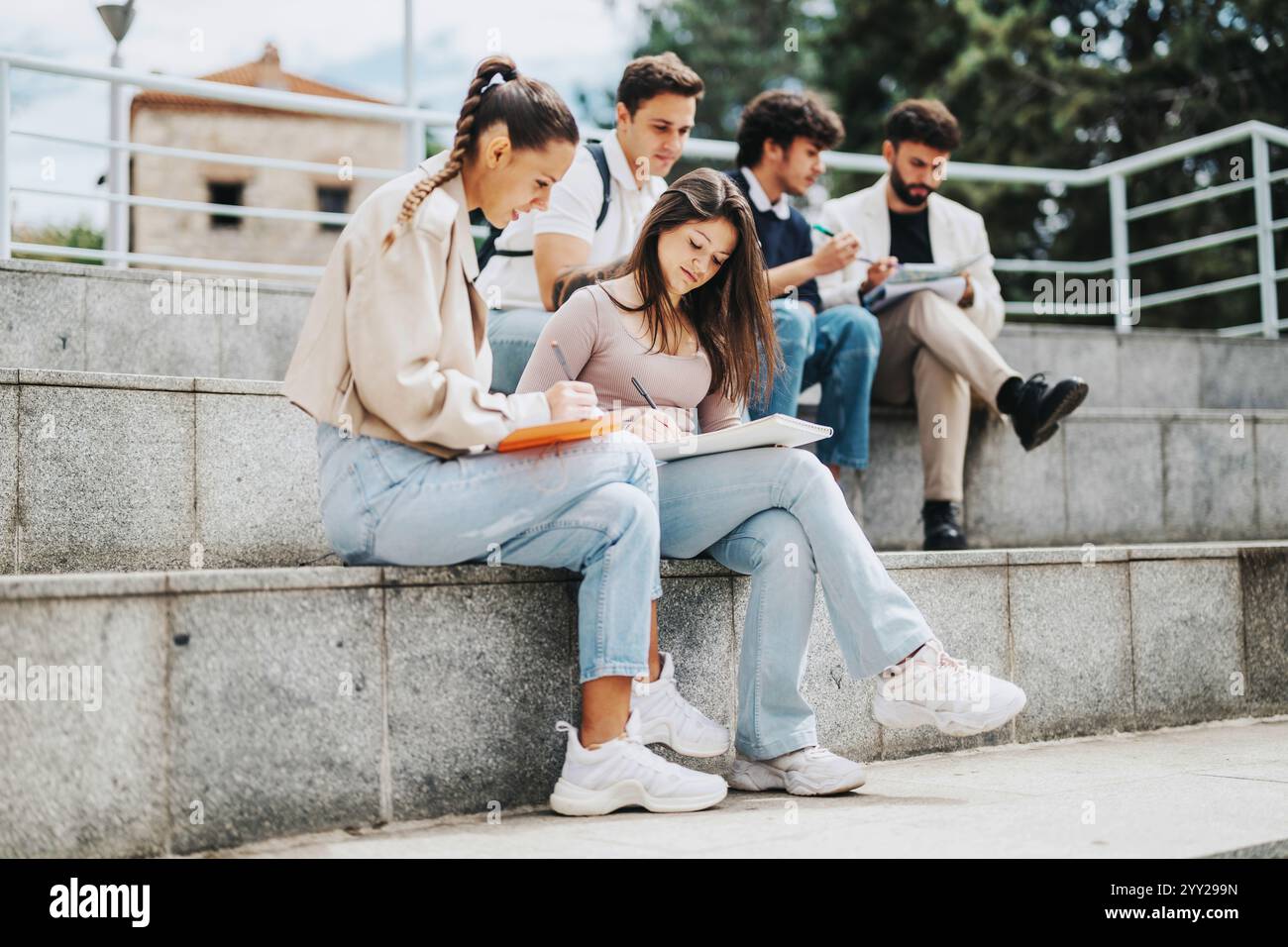 Outdoor study session with students and professor at a university ...