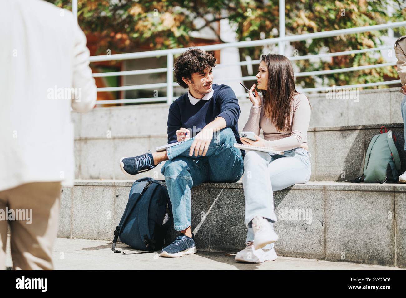 High school students receiving outdoor guidance from a helpful ...