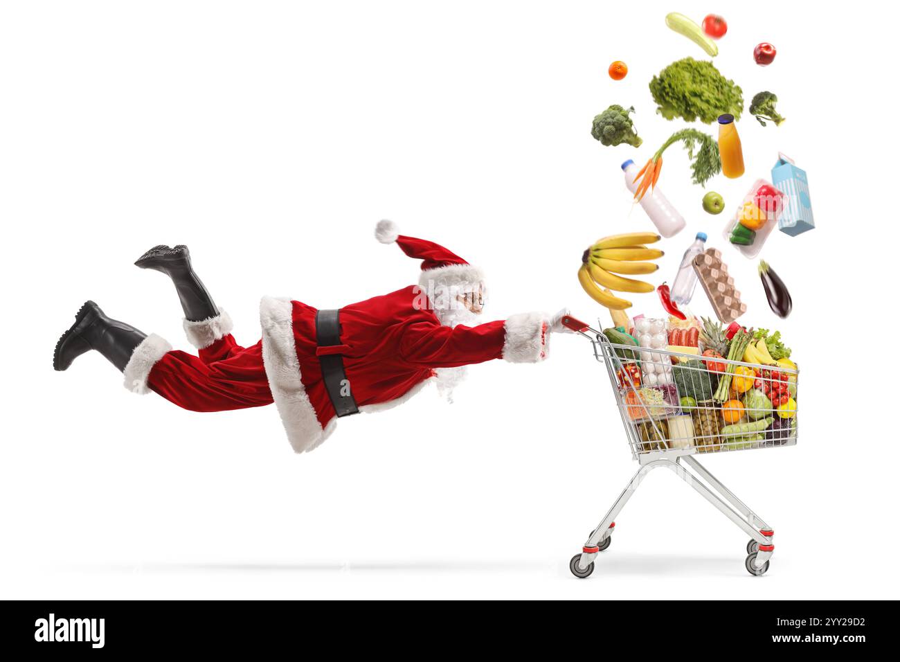 Santa claus flaying and holding a shopping cart with falling food ...