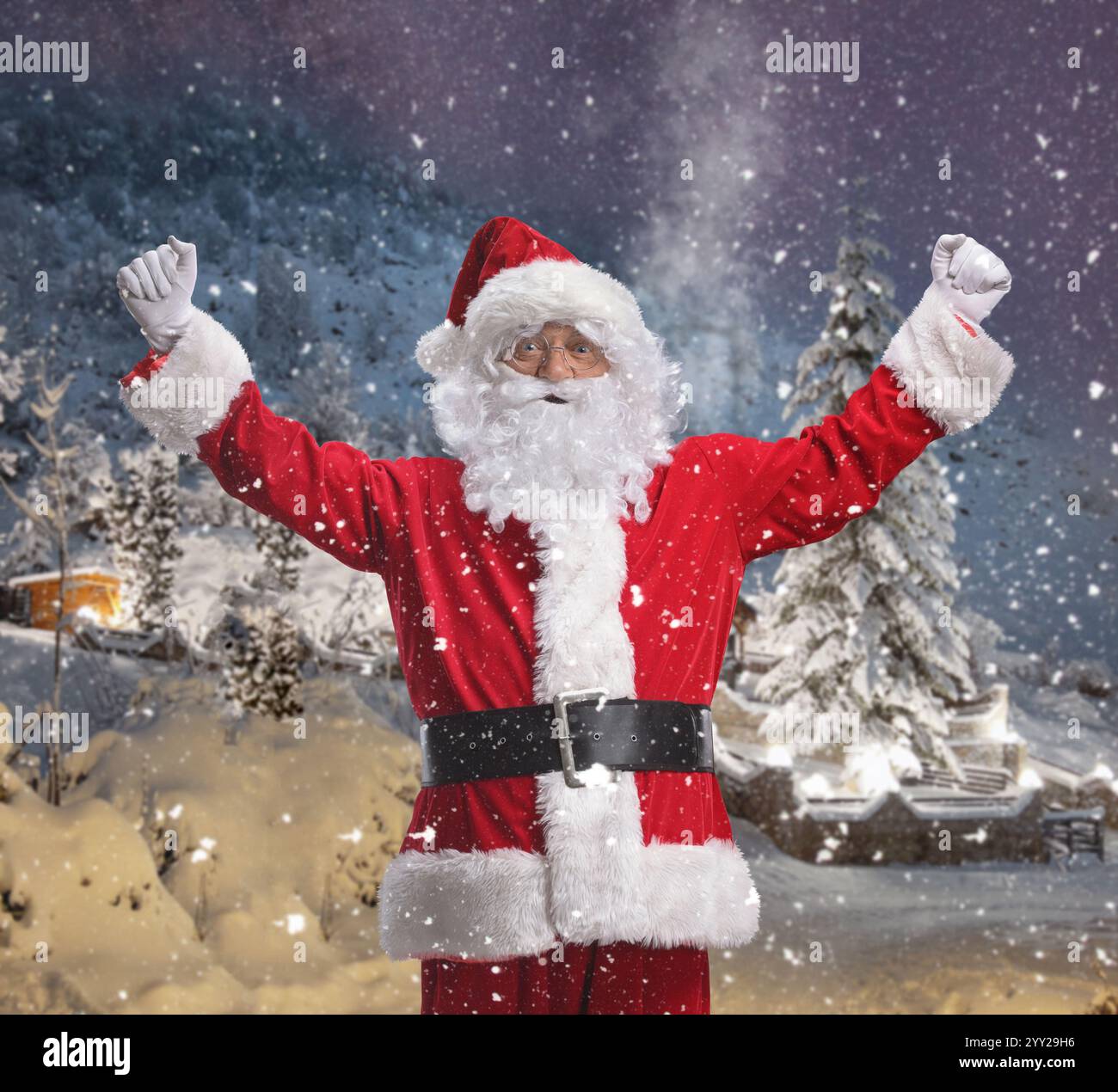 Excited Santa claus on a snowy night at the mountain Stock Photo - Alamy