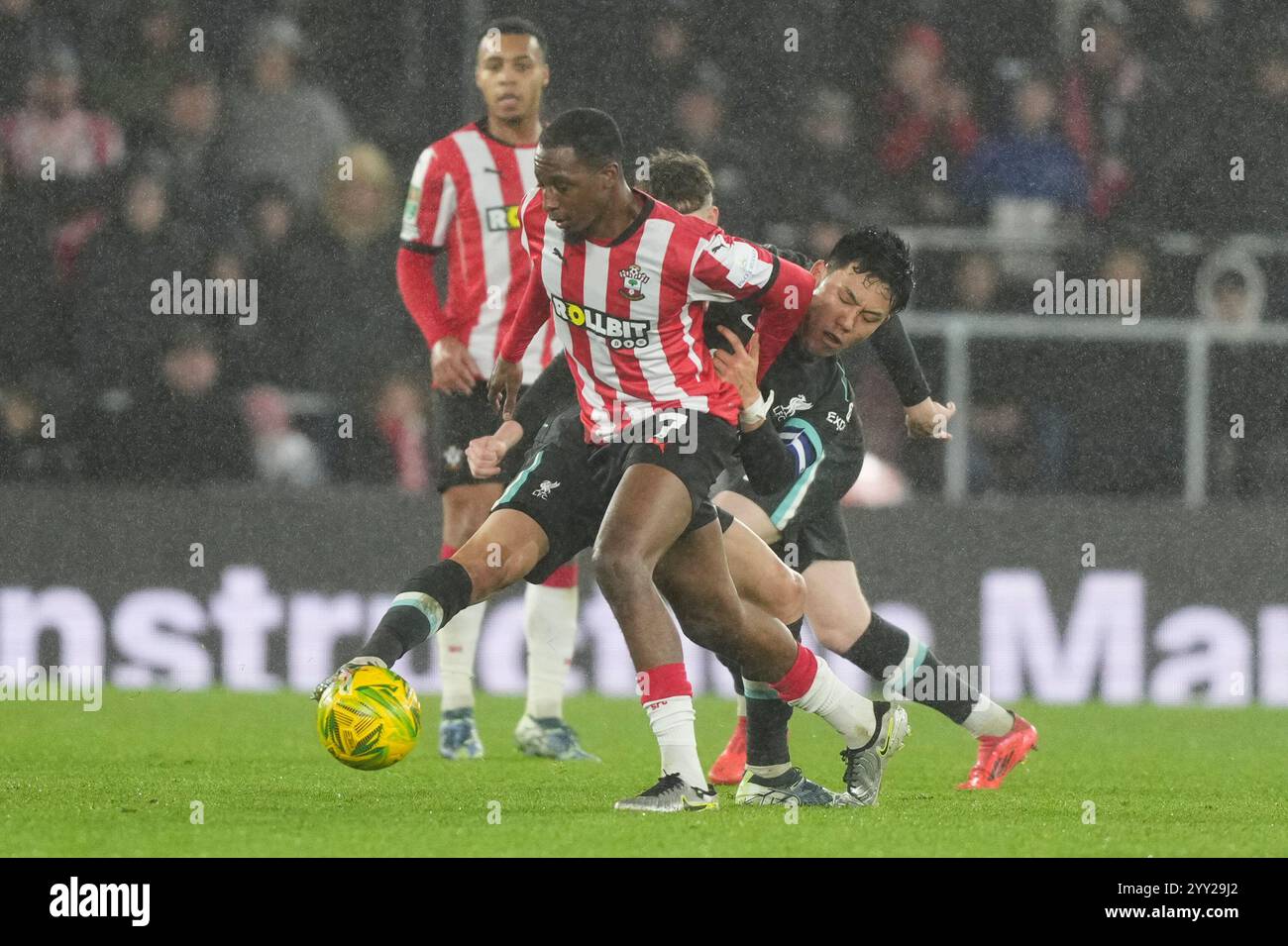 Southampton's Joe Aribo, left, and Liverpool's Wataru Endo fight for ...