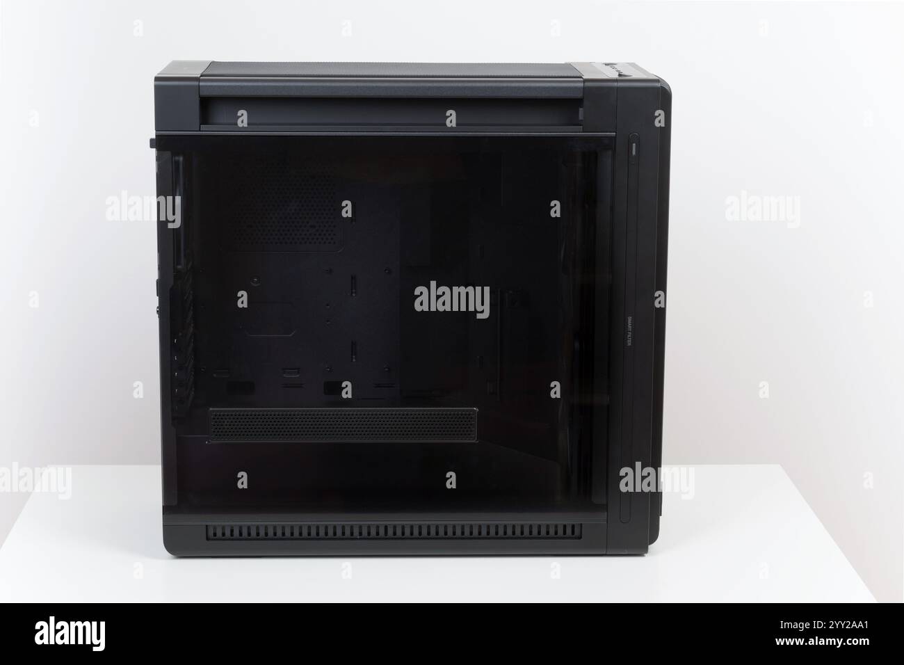 Side view of empty big tower, PC case, chassis, tempered-glass left ...