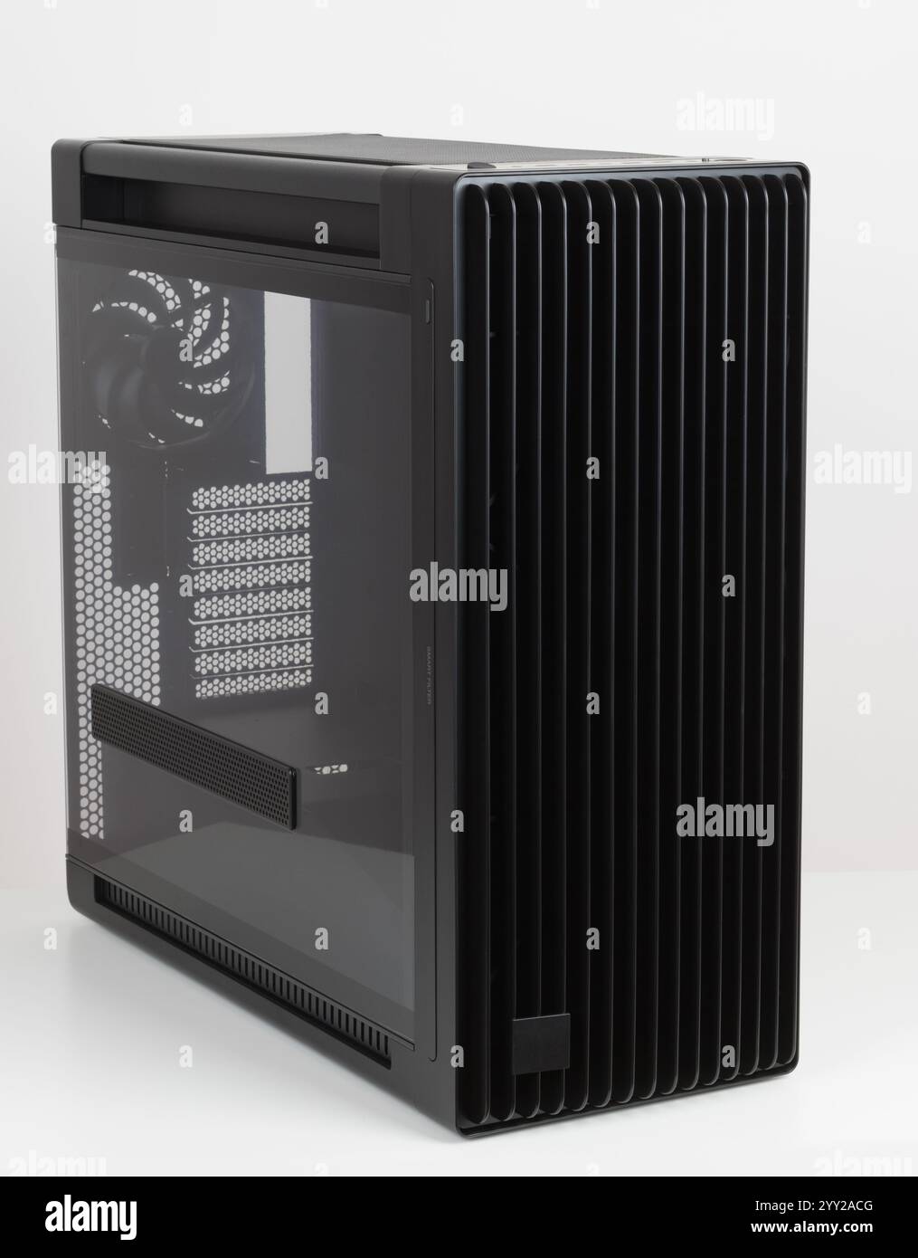 Side view of empty big tower, PC case, chassis, tempered-glass left ...