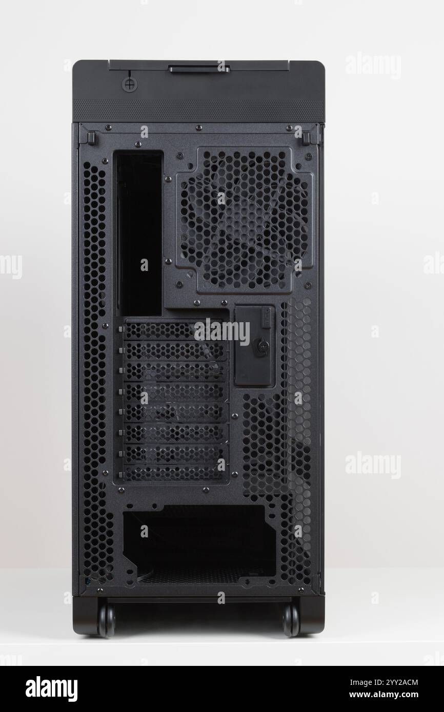 Back side of empty big tower computer case, chassis , effortless ...