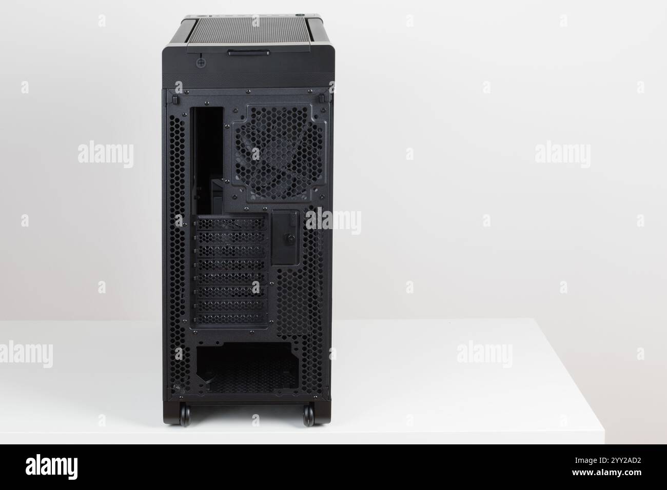 Back side of empty big tower computer case, chassis , effortless ...