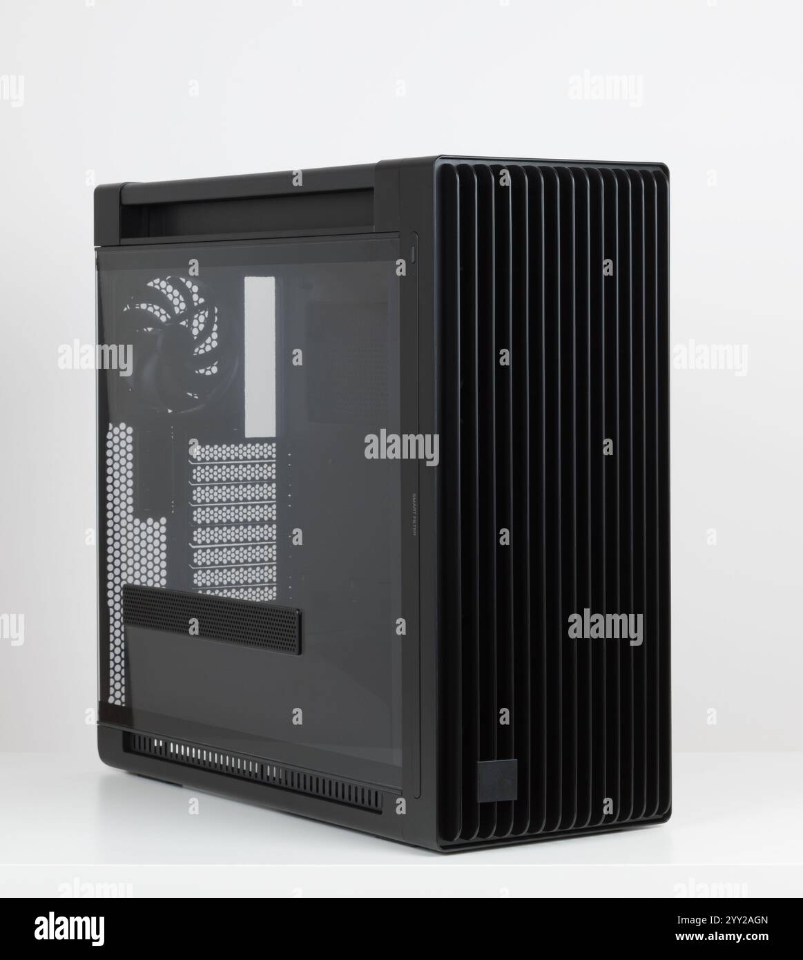 Side view of empty big tower, PC case, chassis, tempered-glass left ...