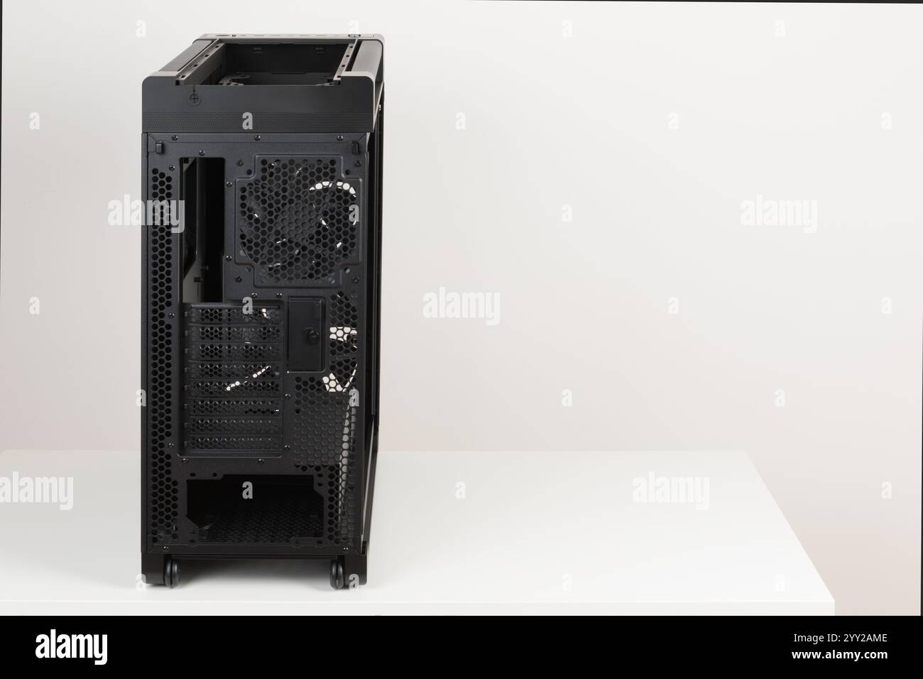 Back side of empty big tower computer case, chassis , effortless ...