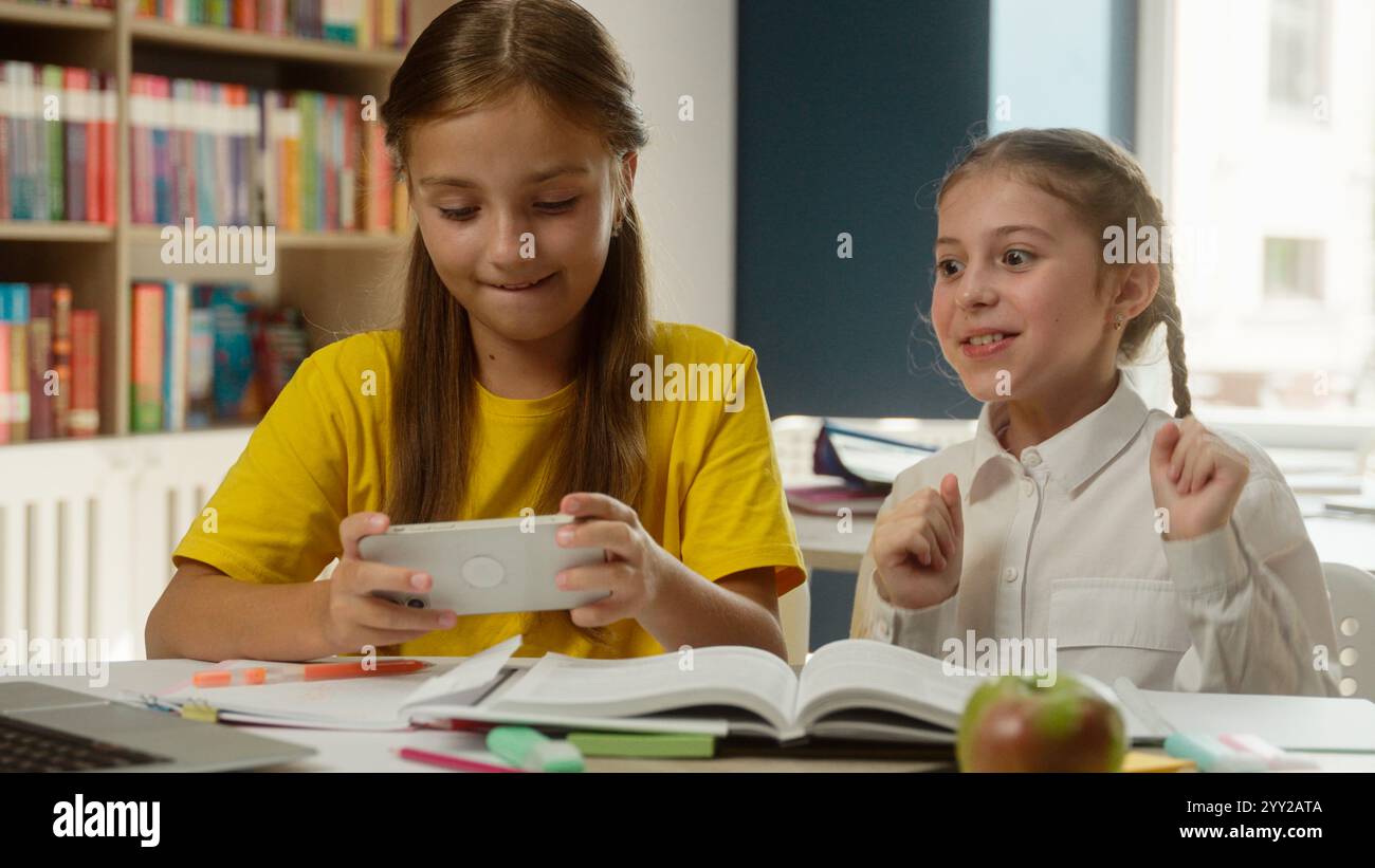 Female classmates little girls children kids gen z teenagers pupils ...