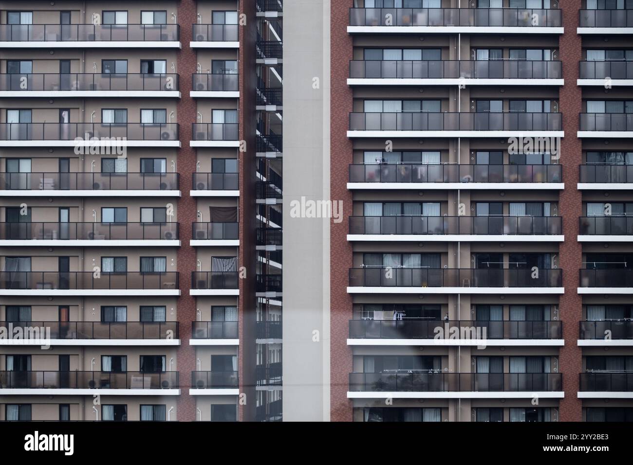 Modern apartment building with repeating balconies. Concept of urban ...