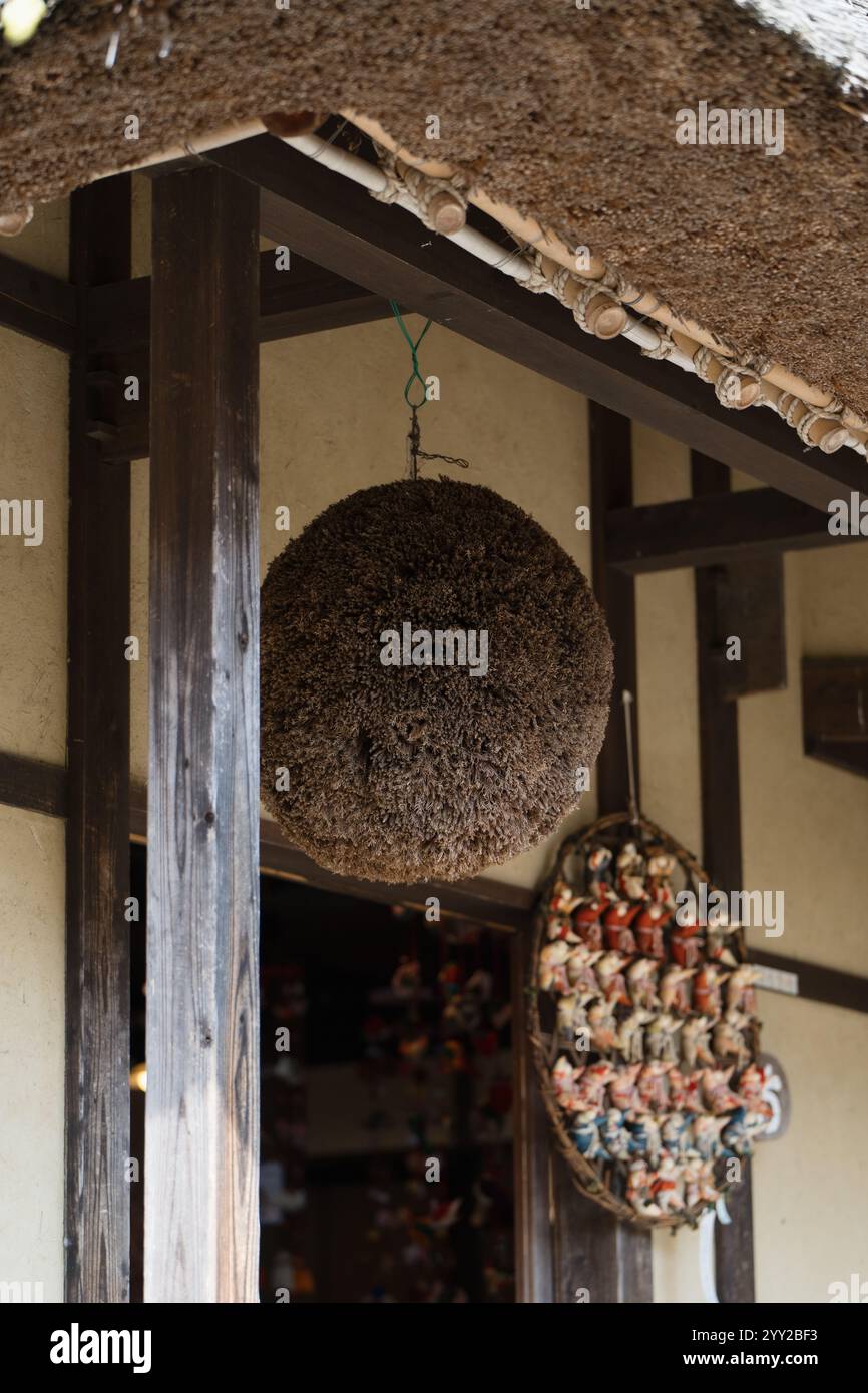 Traditional Japanese sugidama hanging outside. Concept of sake brewing ...