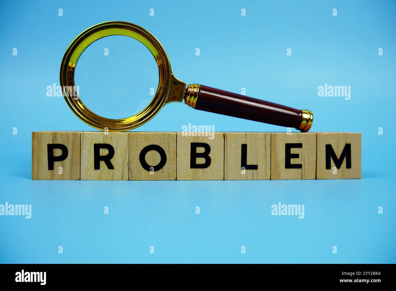 Problem with wooden blocks alphabet letters and Magnifying glass on ...