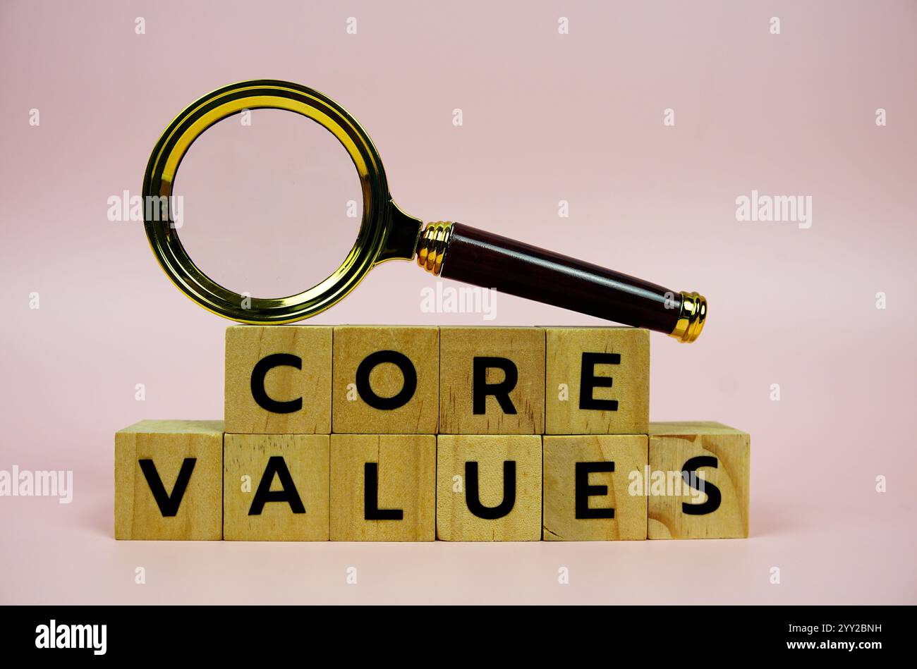 Core Values with wooden blocks alphabet letters and Magnifying glass on ...
