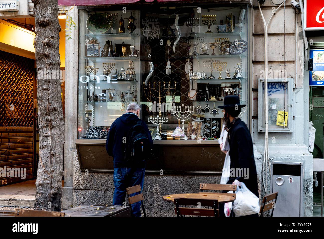 Jerusalem, Israel. 17th Dec, 2024. A person window shopping for ...