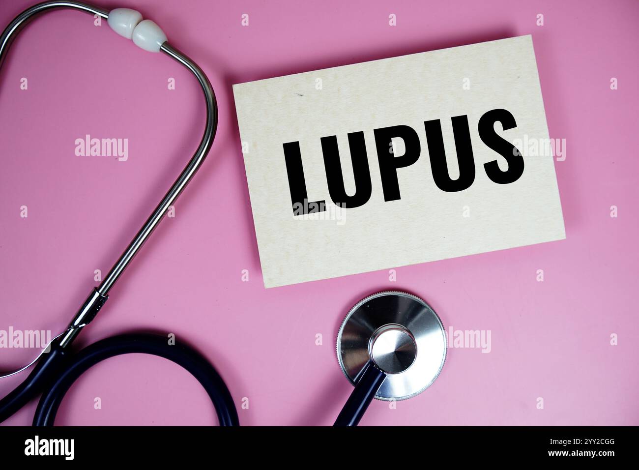 Lupus text with stethoscope on pink background, Healthy and wellness ...