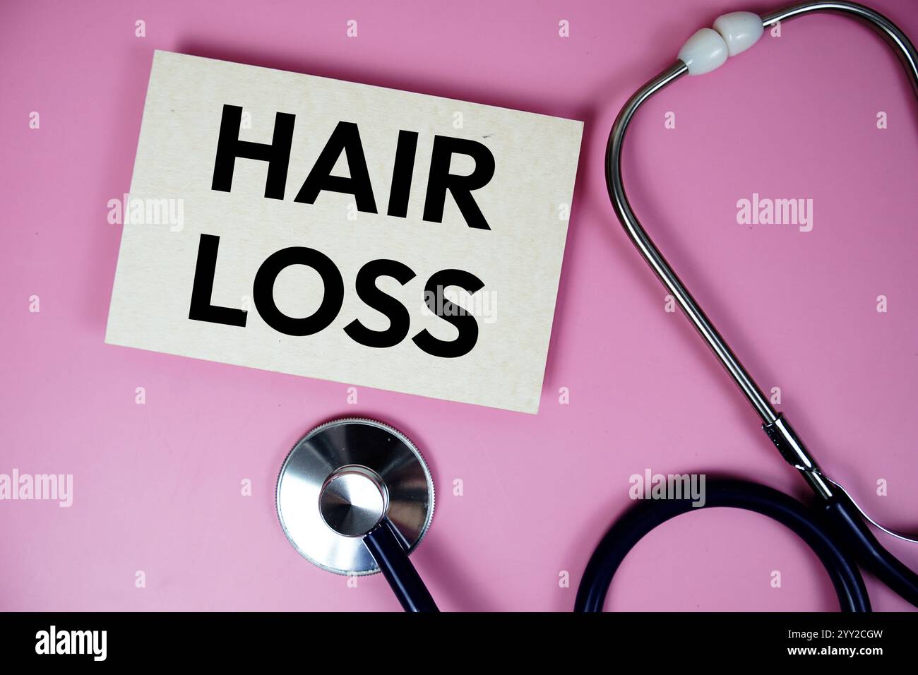 Hair Loss text with stethoscope top view on pink background, Healthy ...