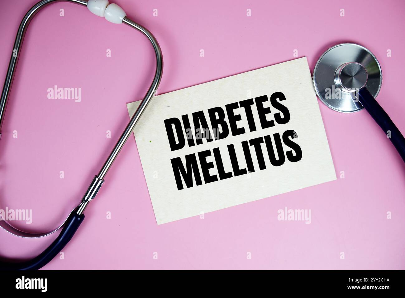 Diabetes Mellitus text with stethoscope on pink background, Healthy and ...