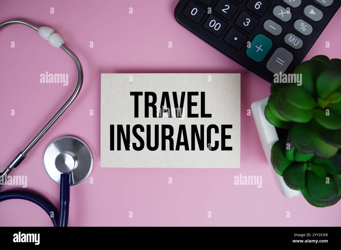 Travel Insurance text with calculator, stethoscope on pink background ...