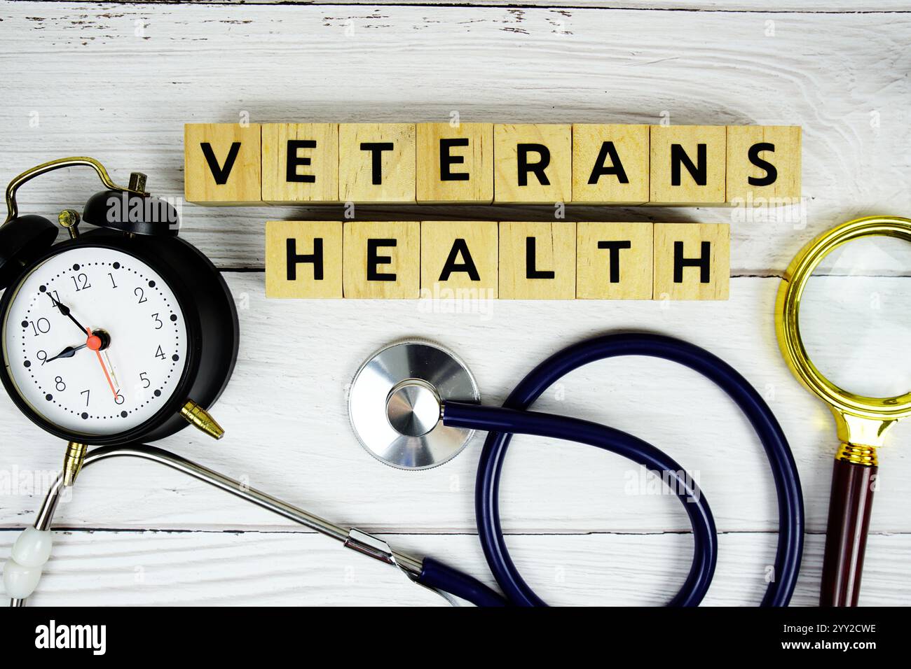Veterans Health with wooden blocks alphabet letters and stethoscope on ...