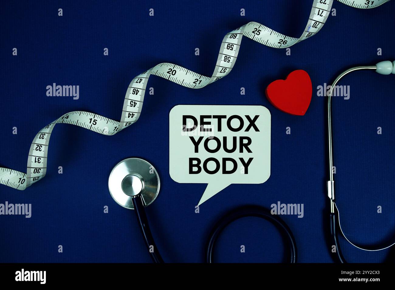 Detox Your Body text on speech bubble with Red heart , measure tape and ...