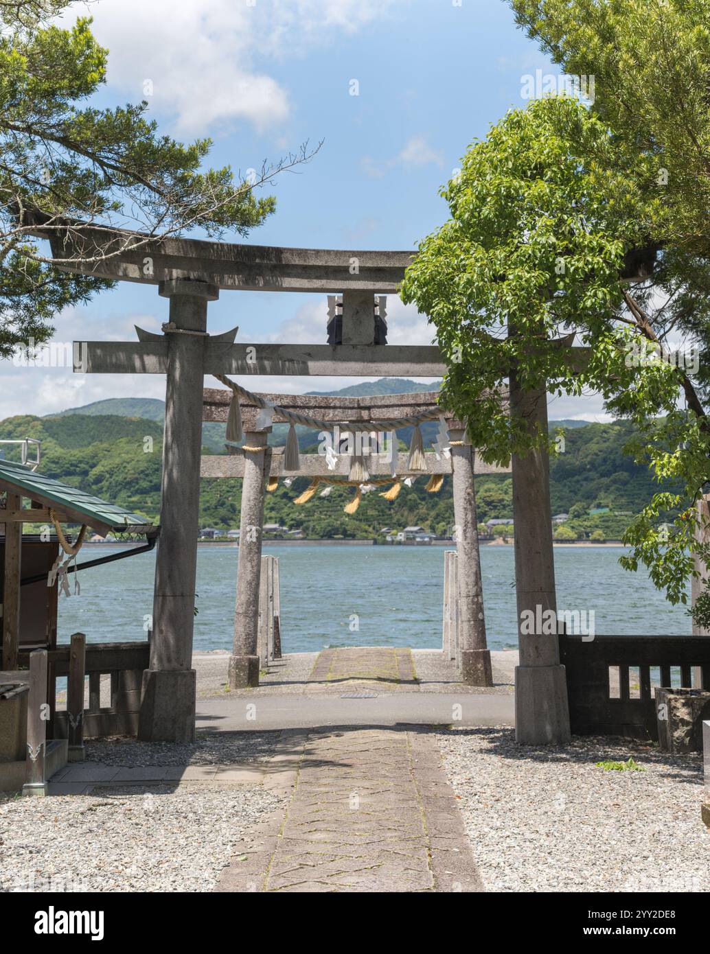 Traditional Japanese Torii gate near water in Kochi. Concept of ...