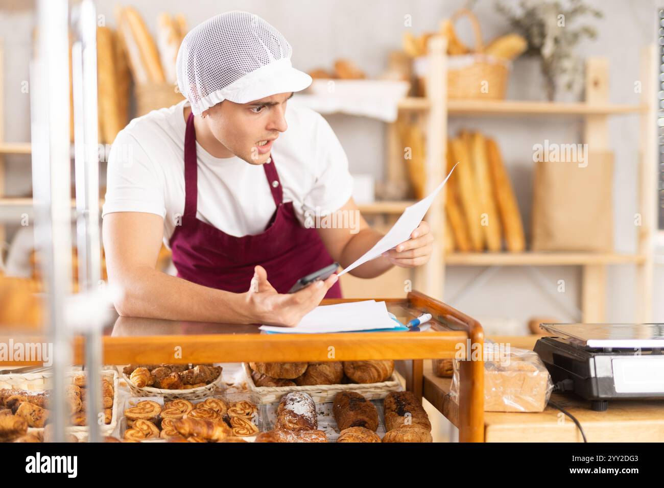 Upset bakery owner shocked by rising utility bills and taxes Stock ...