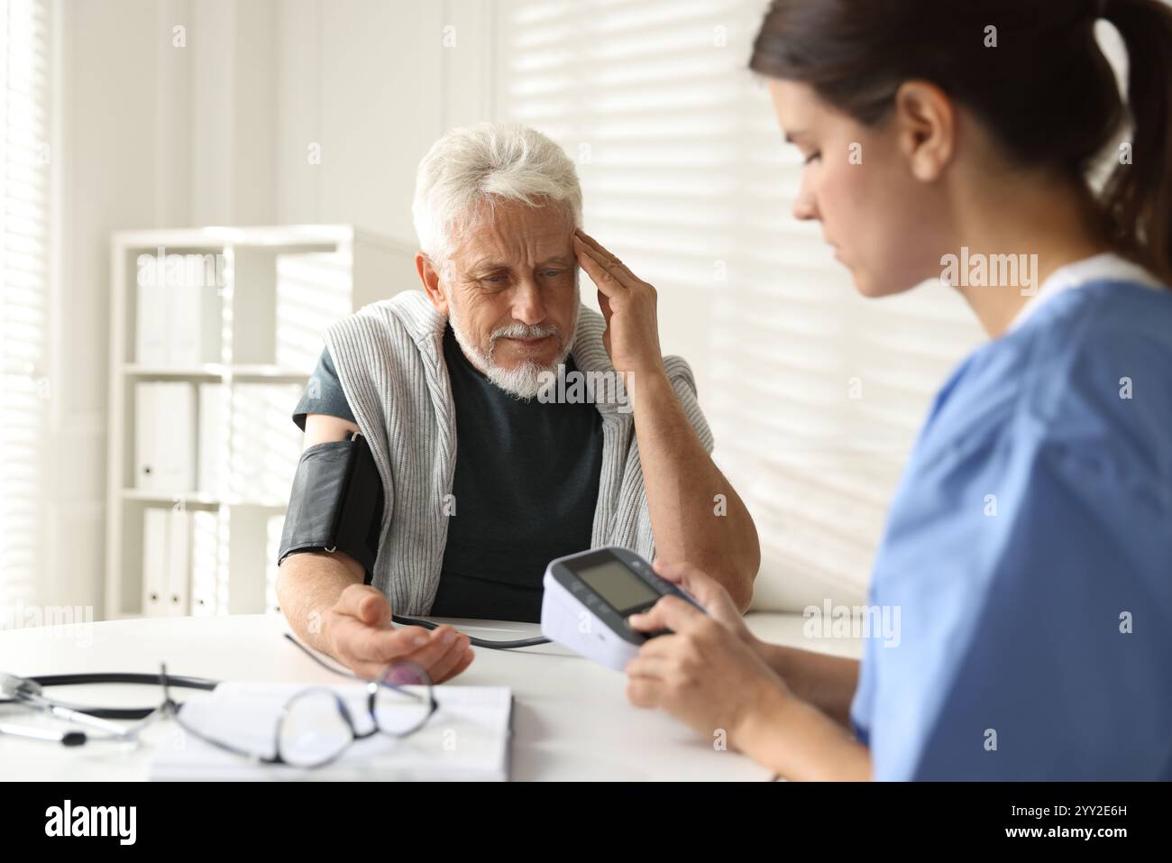 Male doctor measuring heart blood hi-res stock photography and images ...