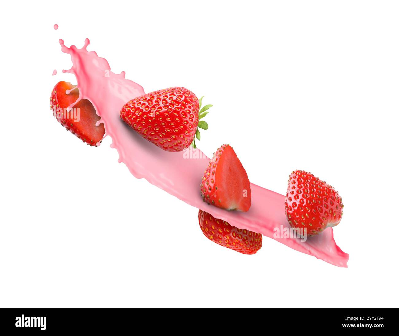 Strawberry milkshake splash with berries in air on white background ...