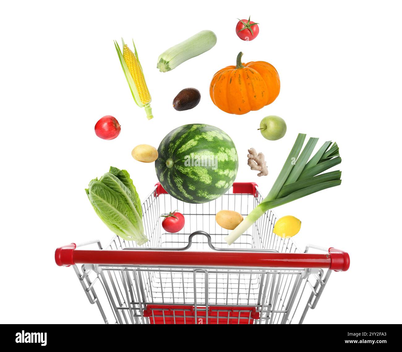 Groceries falling into shopping cart on white background Stock Photo ...