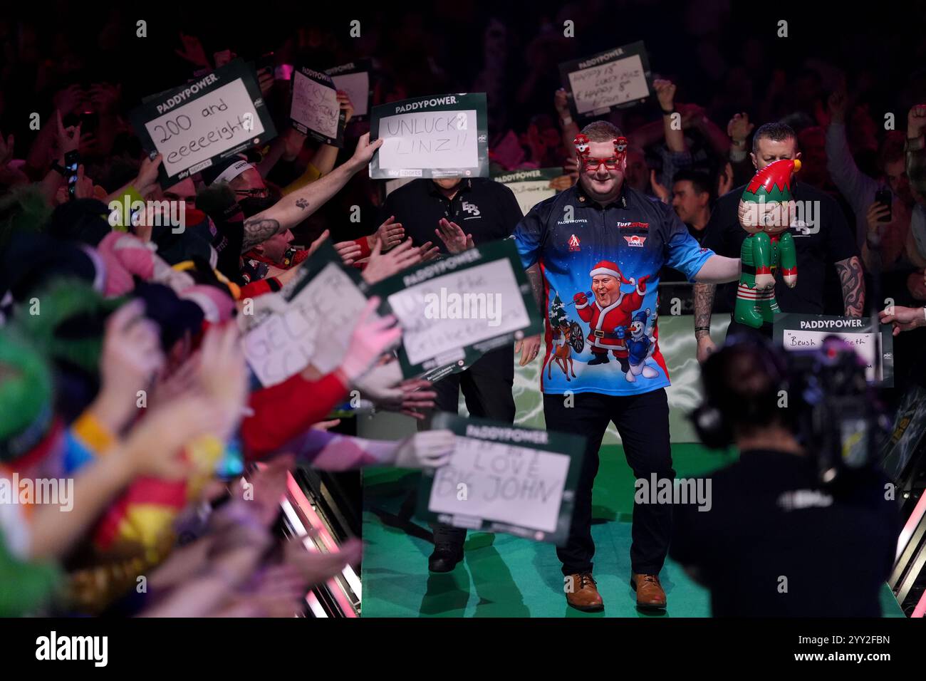 Ricky Evans walks out ahead of his first round match against Gordon ...