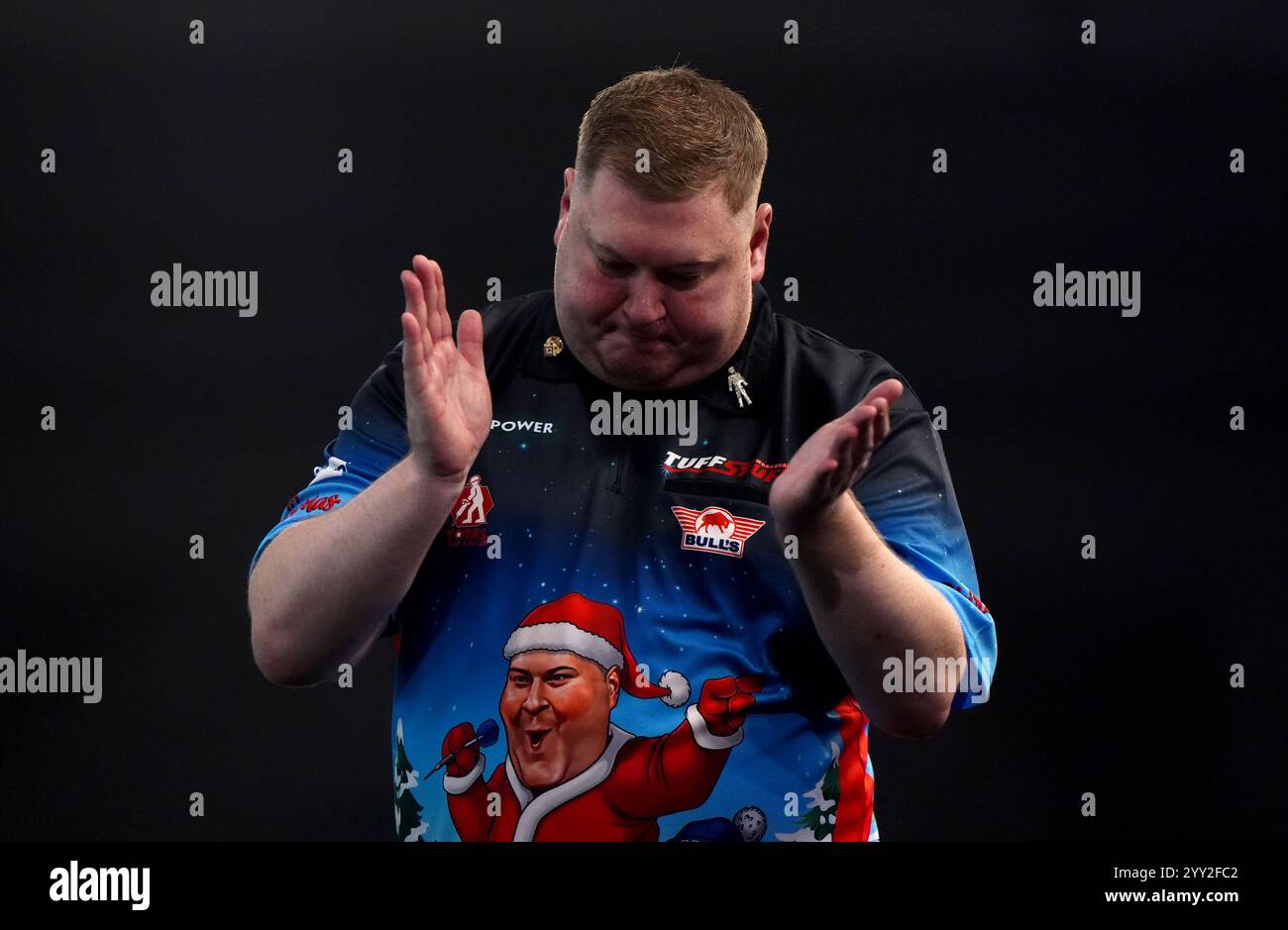 Ricky Evans celebrates during his first round match against Gordon ...