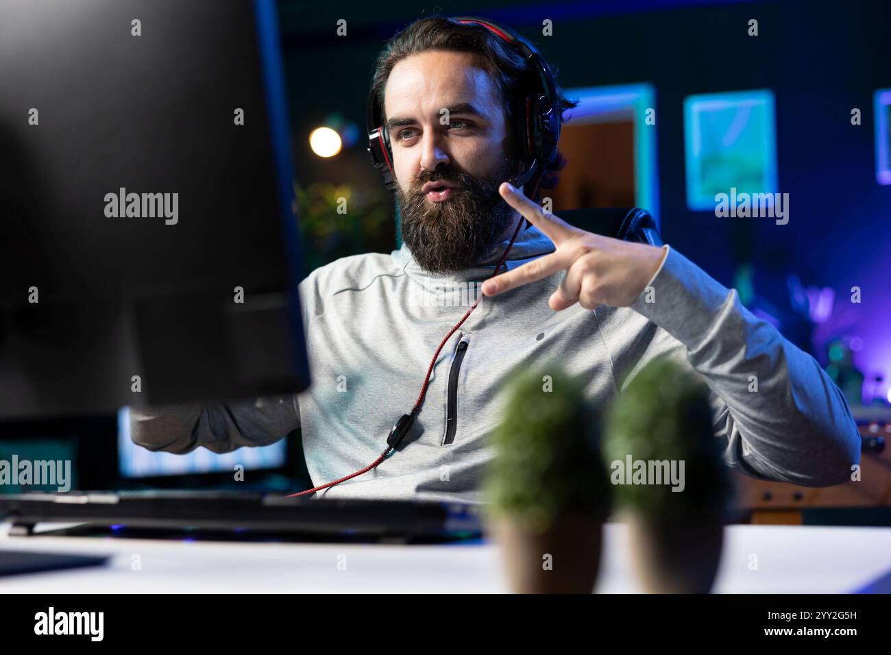 Happy gamer celebrating winning game, killing all enemies and finishing ...