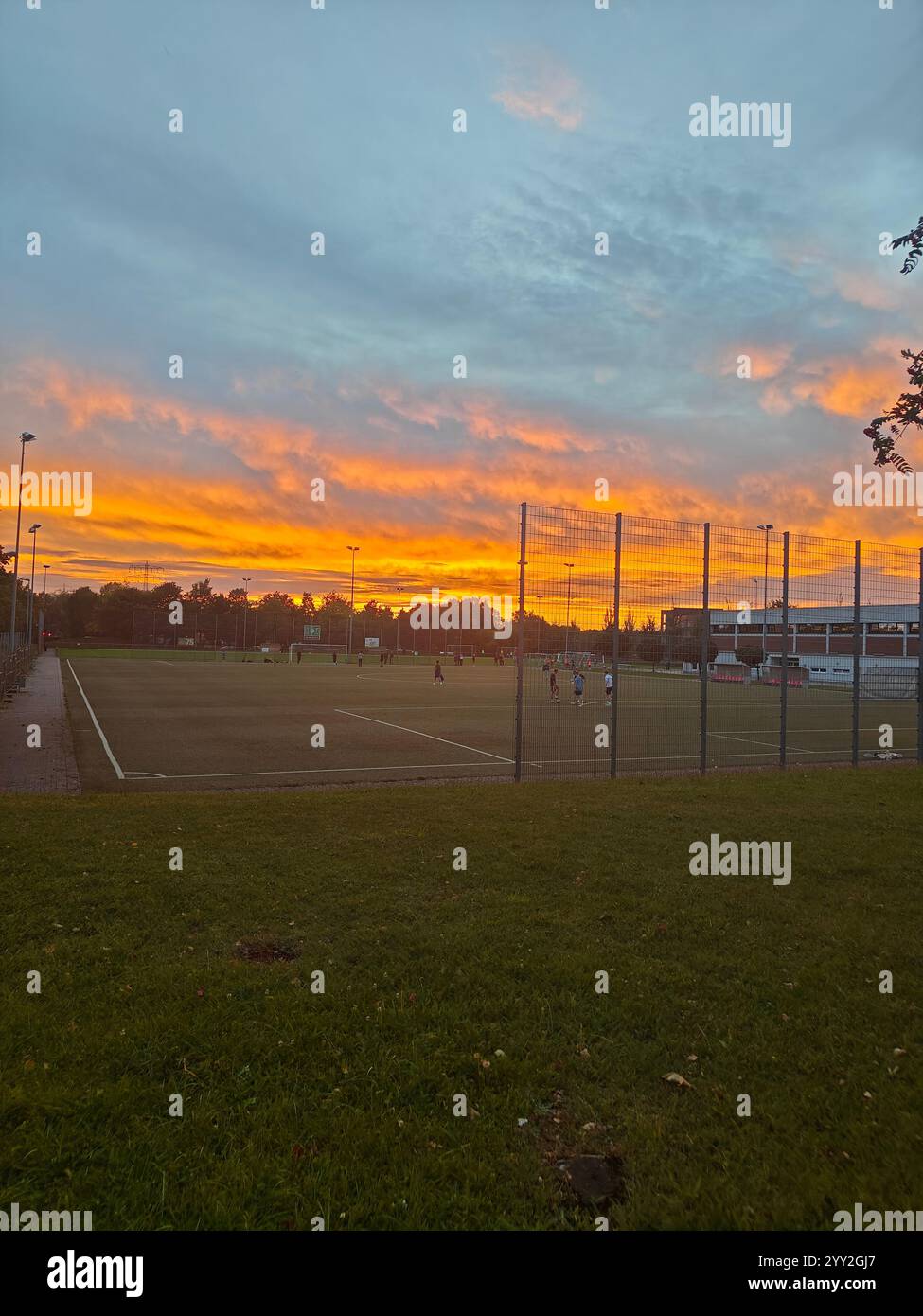 Outdoors football field during sunset Stock Photo - Alamy
