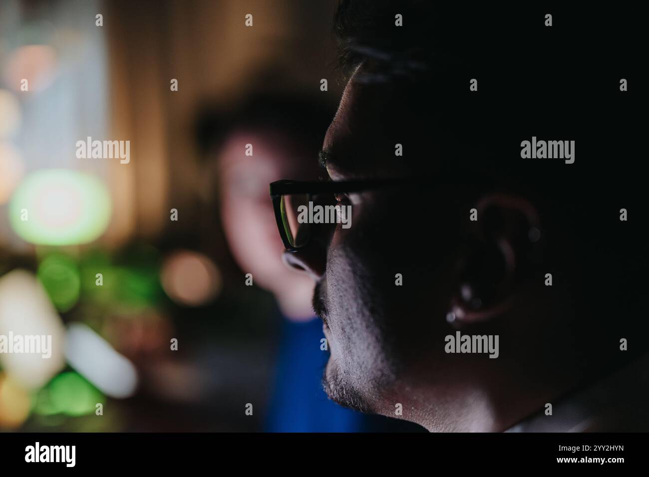 Business people working overtime on deadline-driven project at night ...