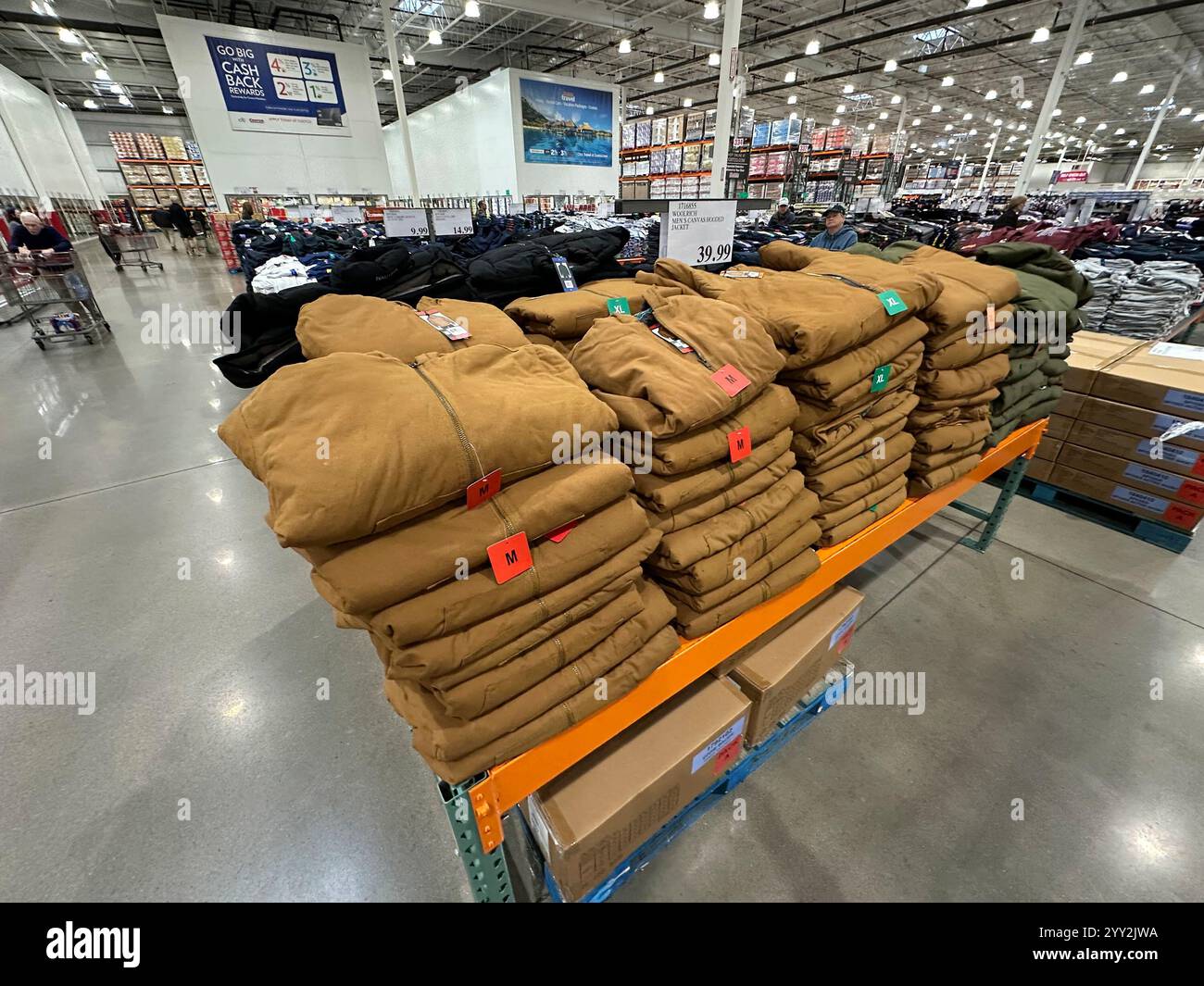 Winter jackets sit on display in a Costco warehouse Wednesday, Dec. 18 ...