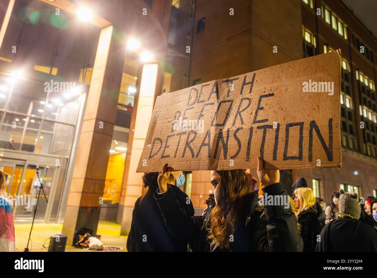 Leeds, UK. 18 DEC, 2024. Protestor holds "Death Before Detransition ...