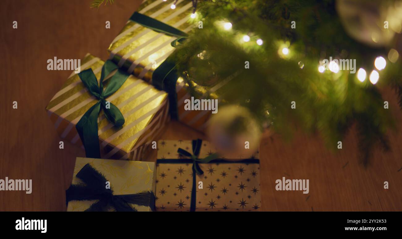Christmas Gifts Waiting Under Tree in Decorative Packaging Stock Photo ...