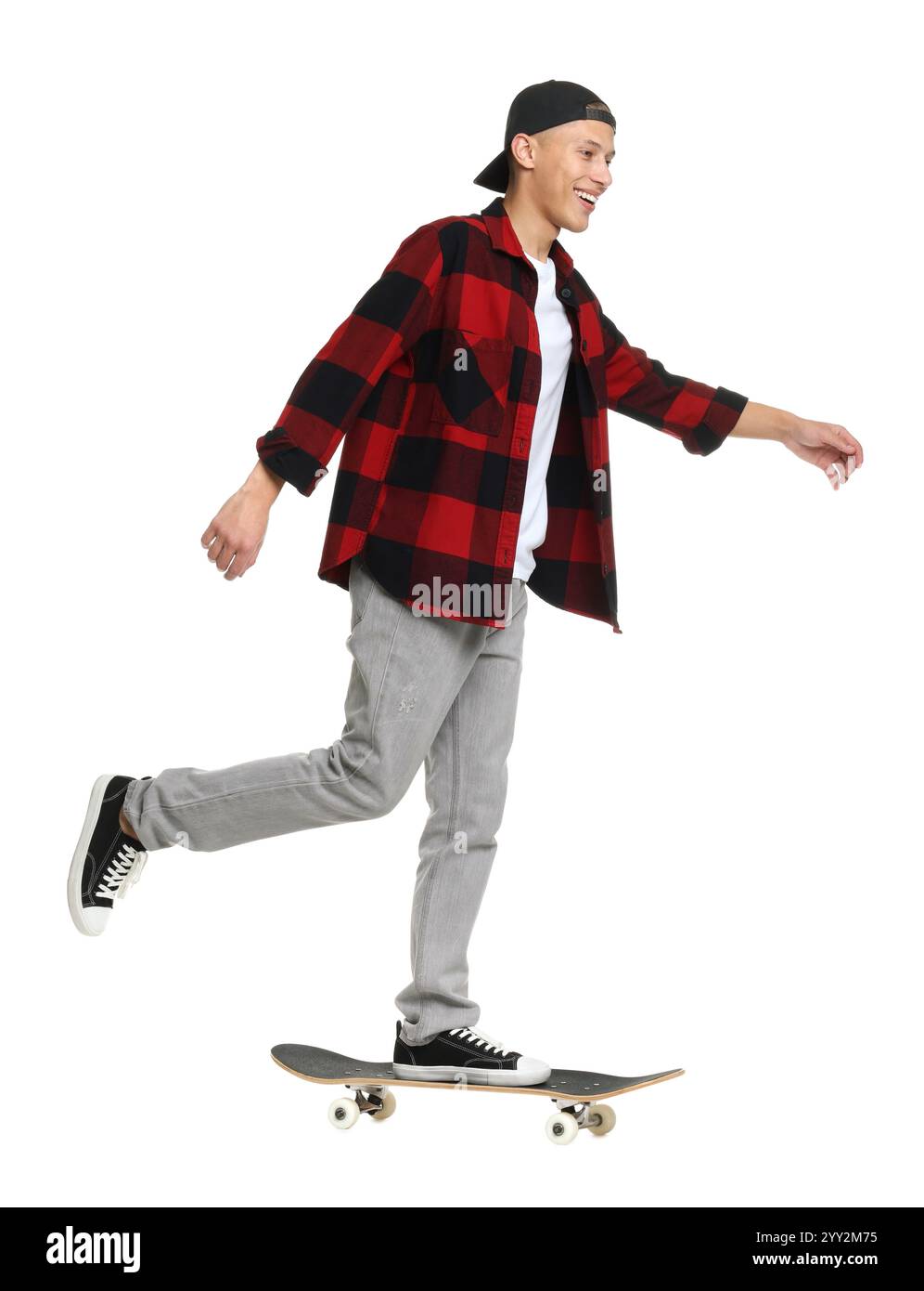 Person riding skate board on Cut Out Stock Images & Pictures - Alamy