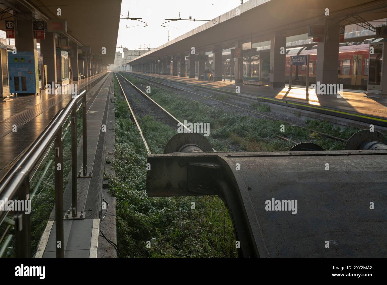empty railway station, without trains, perspective of the railway line ...