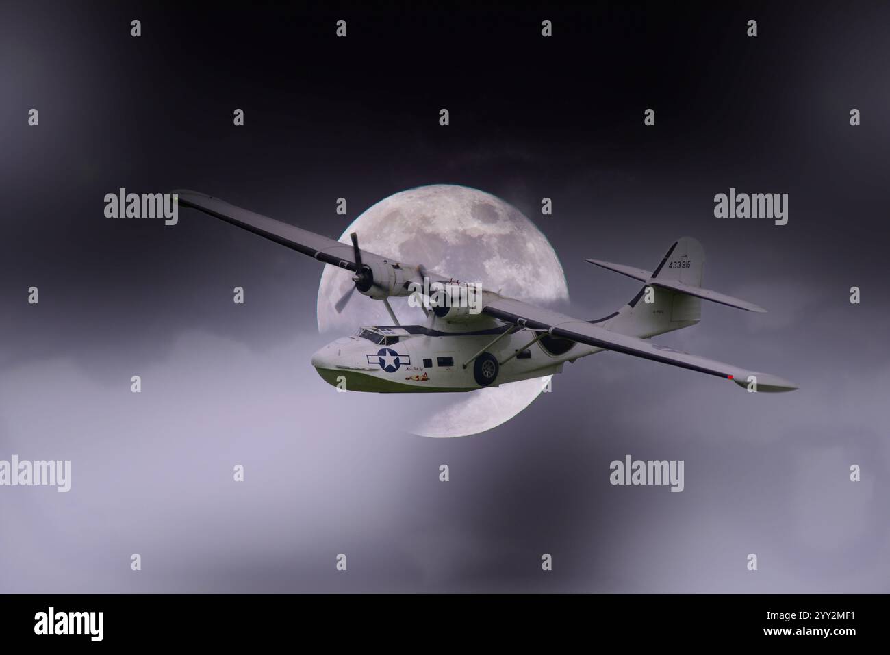 Consolidated Catalina flying boat at night with a large moon and cloud ...