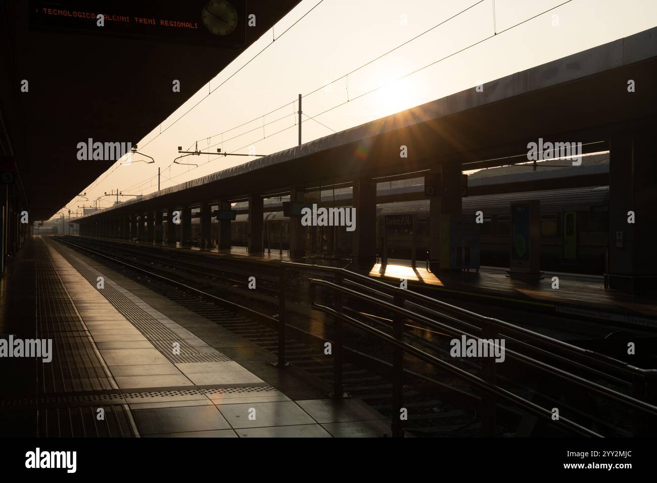 empty railway station, without trains, perspective of the railway line ...